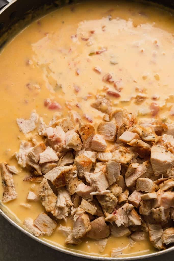 Amazing Cheesy Texas Chicken Spaghetti One Pan Recipe - The Travel Palate