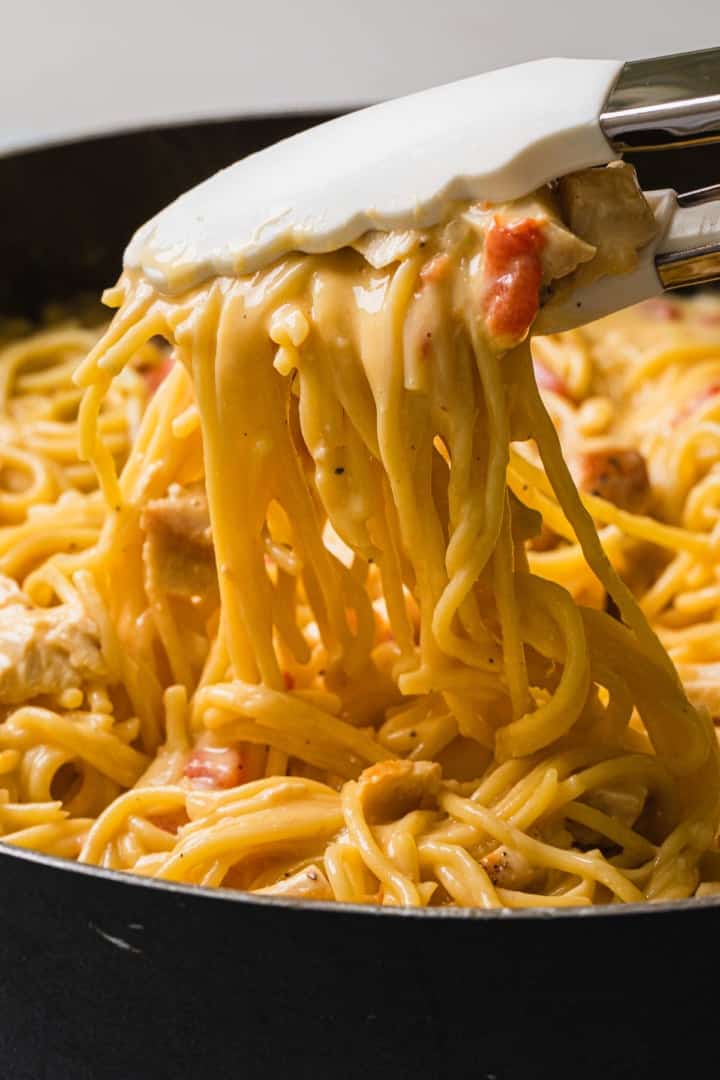 Amazing Cheesy Texas Chicken Spaghetti One Pan Recipe - The Travel Palate