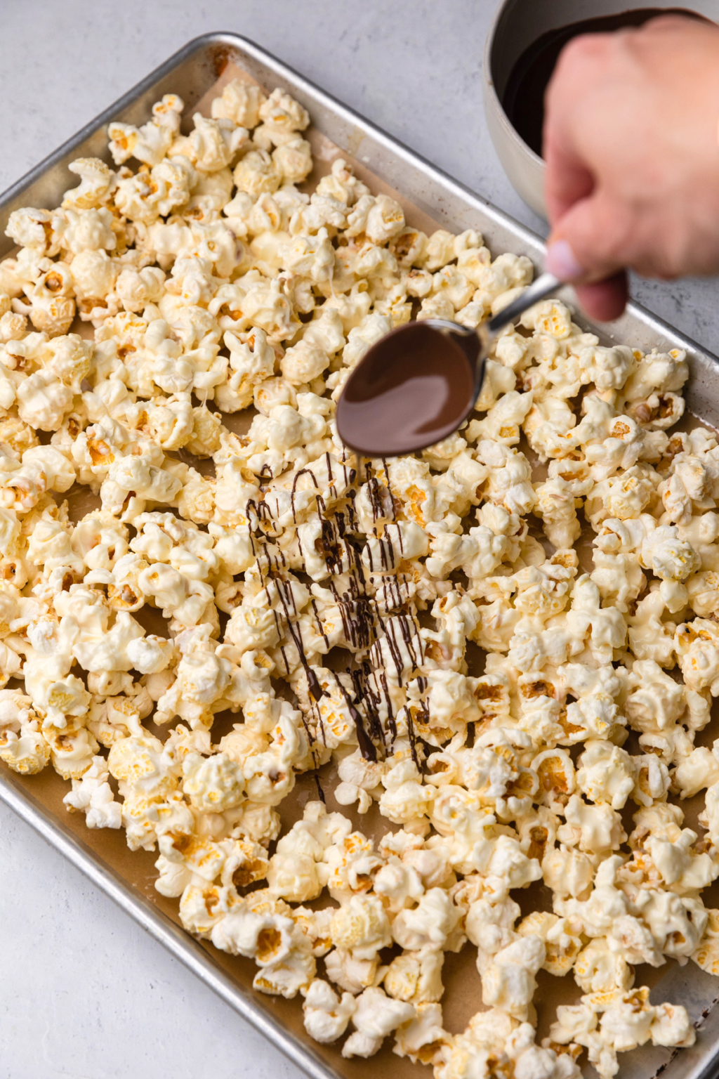 How to Make Chocolate Drizzle Popcorn (Easy Recipe) - The Travel Palate