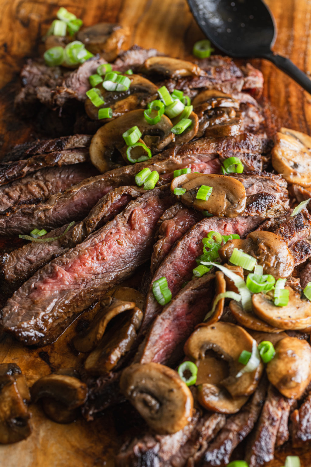 Cast Iron Flank Steak with Mushroom Pan Sauce - The Travel Palate